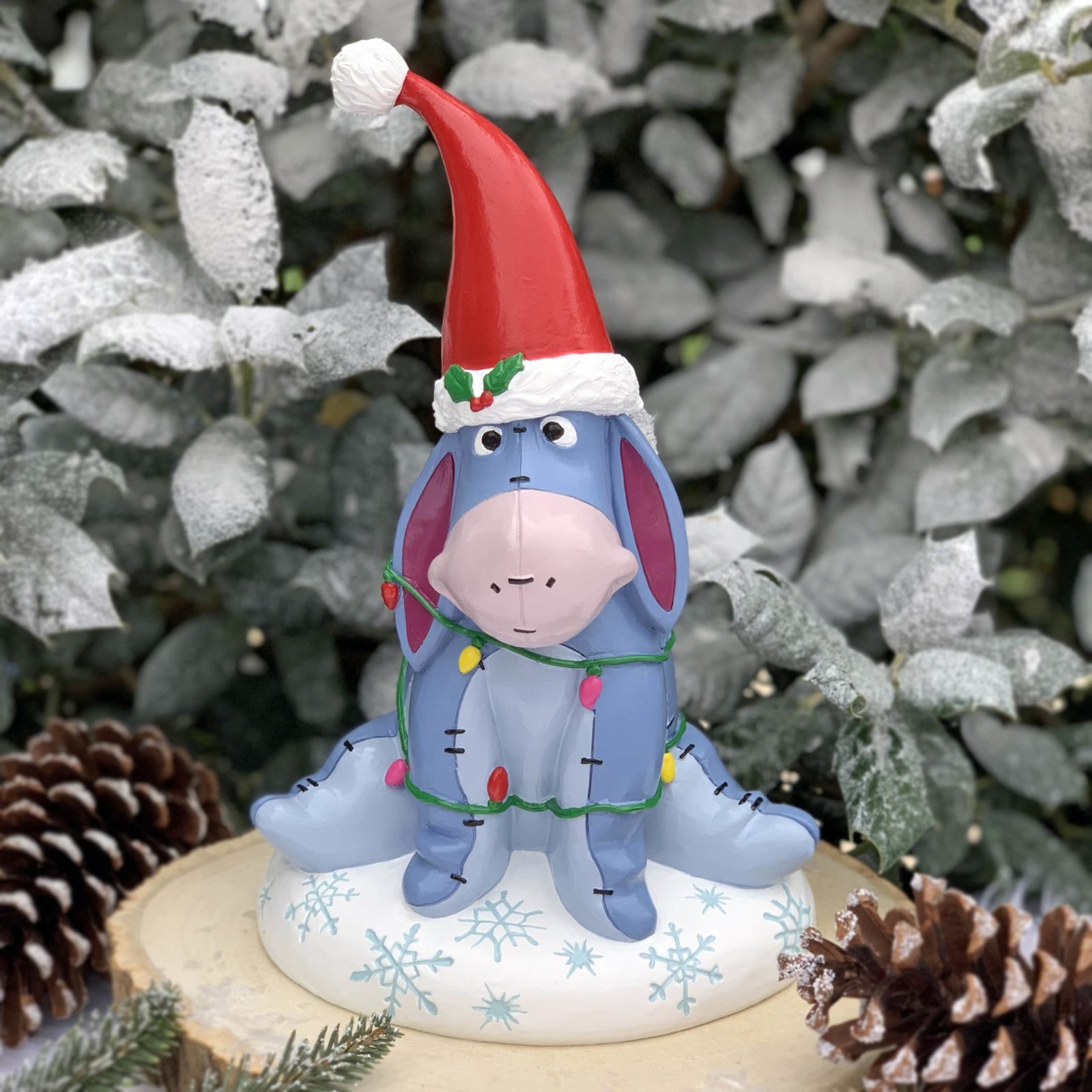 Buy: Eeyore Wrapped in Lights 10″ Statue Disney Flagology.com