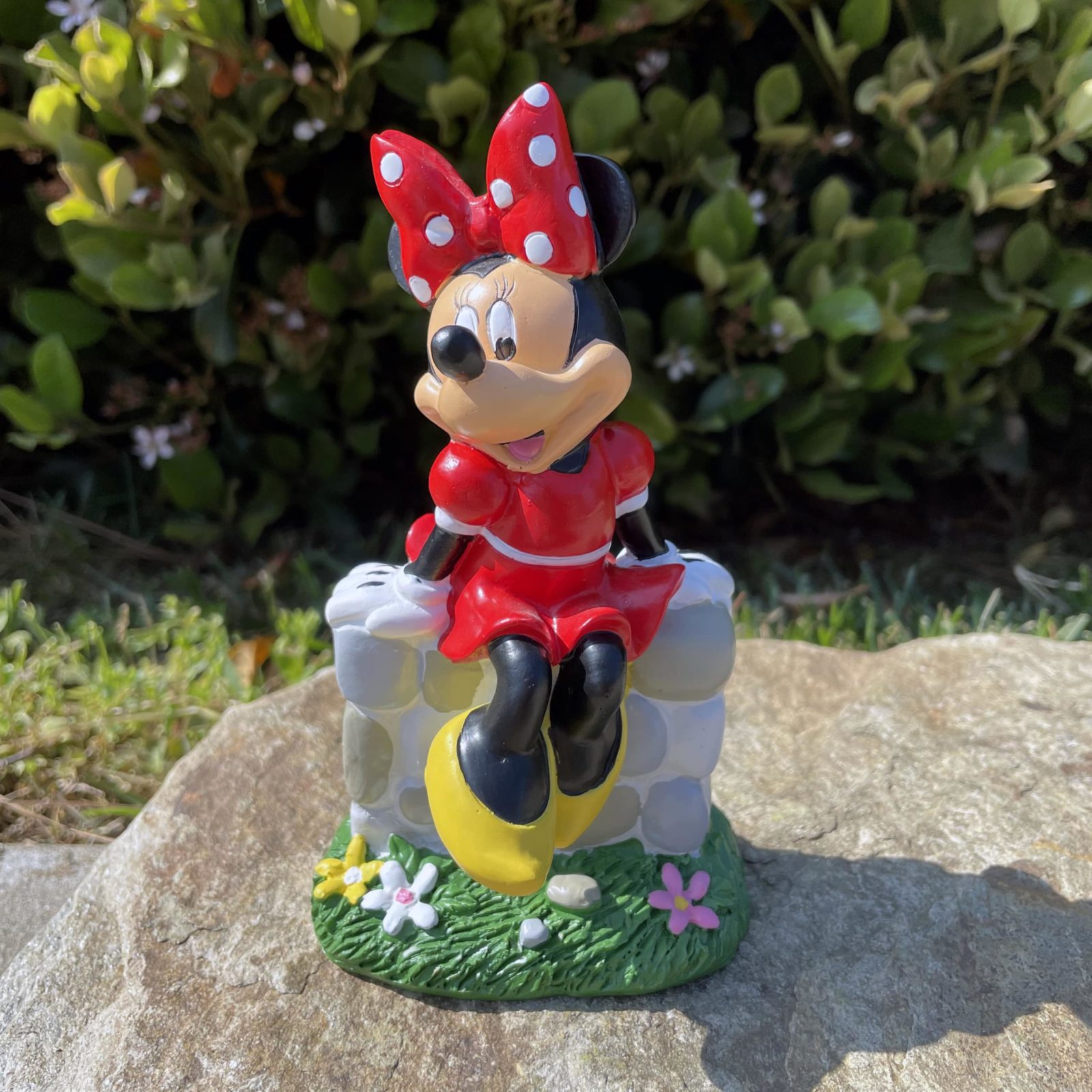 Buy: Minnie Sitting on Rock Wall 6″ Statue Spring Flagology.com